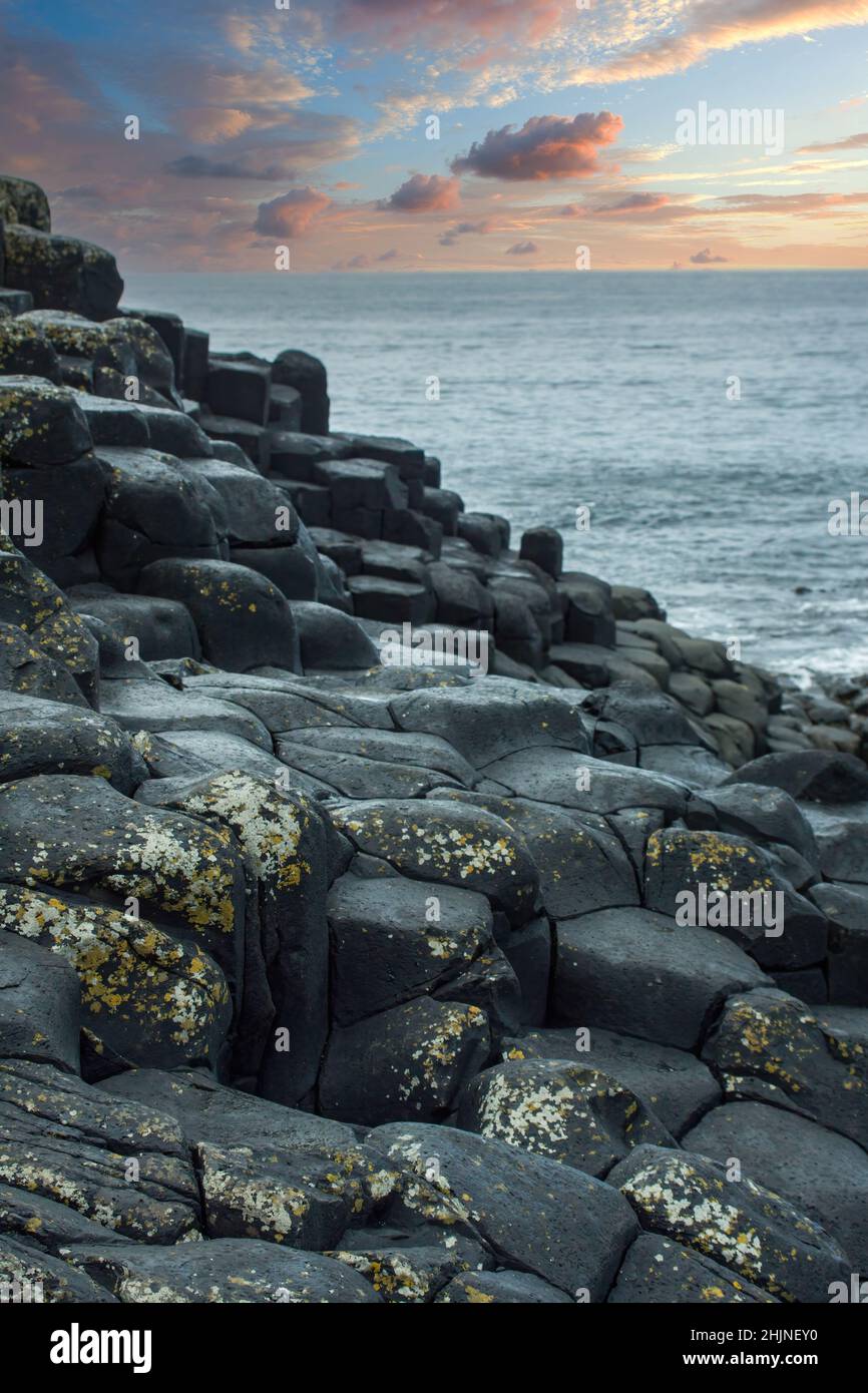Basalt columns tumbling down into the atlantic ocean hi-res stock ...
