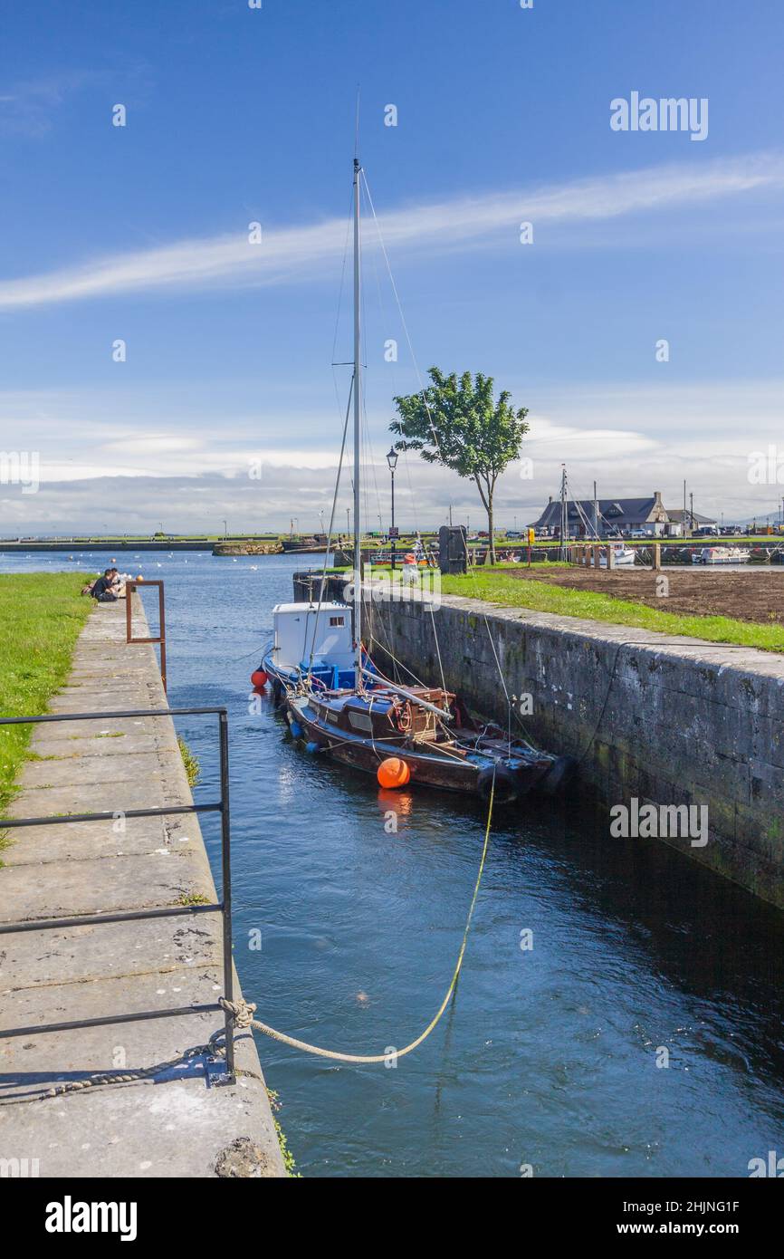 Galway seaport in sunny day, view on the old docks, boats and ships in ...