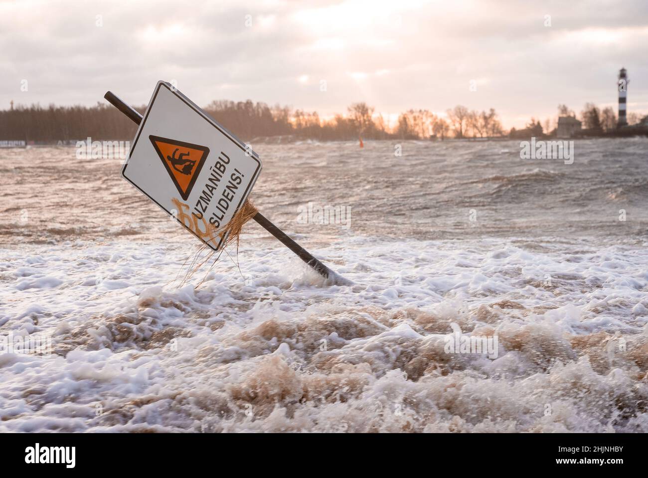 Thunder storm waves crashing on the beach Stock Photo - Alamy