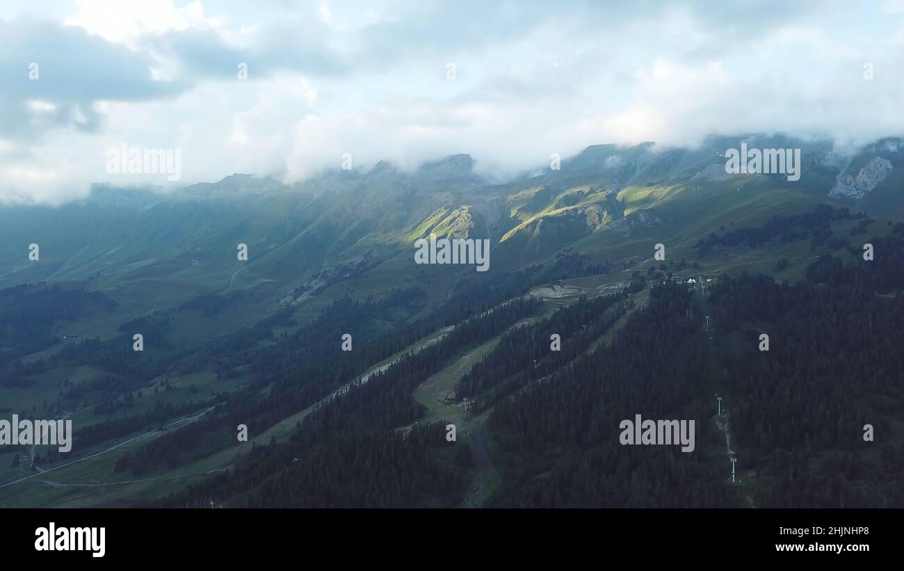 Mountain green range in clouds landscape. Top view of the mountains ...