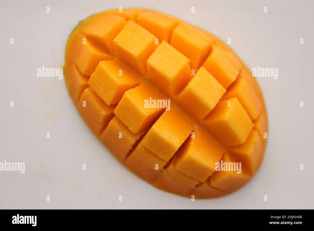 Top view of sliced mango isolated on white background Stock Photo - Alamy