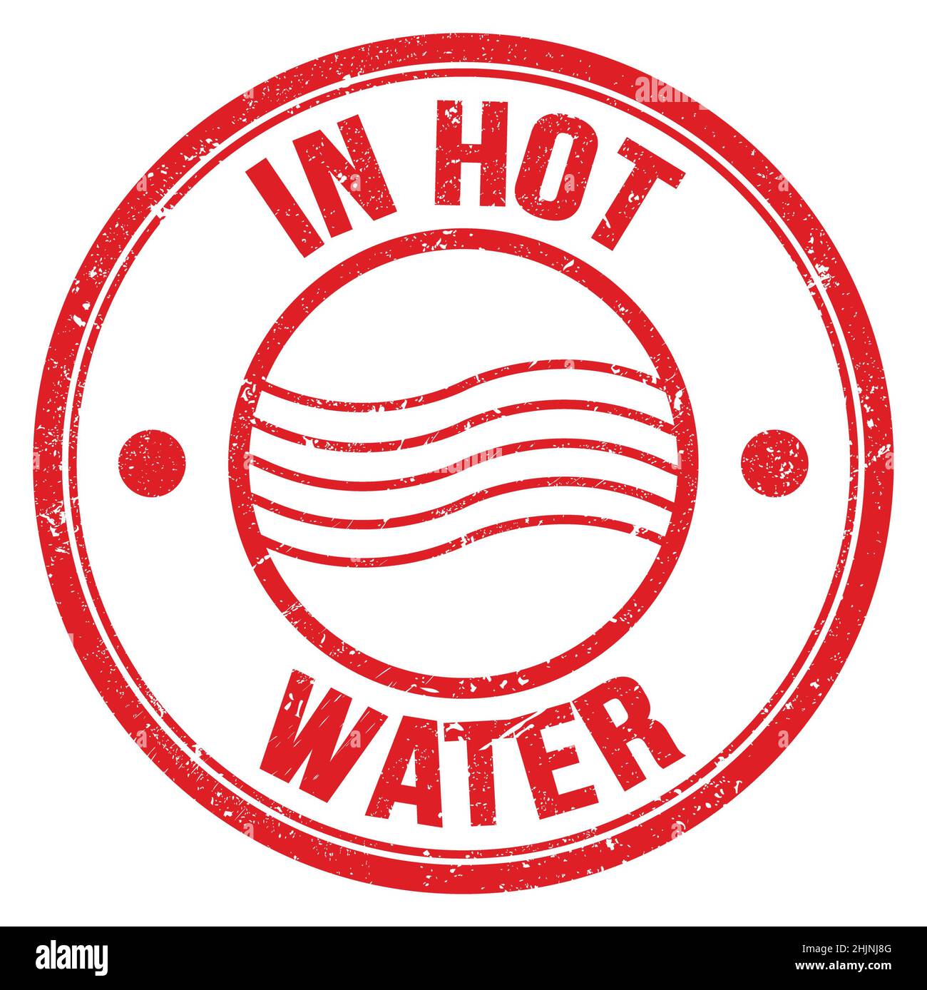 IN HOT WATER text written on red round postal stamp sign Stock Photo ...