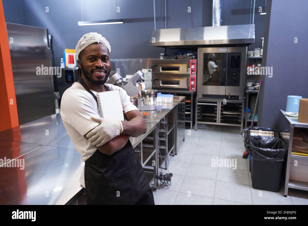 Chef in uniform resting after hard work Stock Photo - Alamy