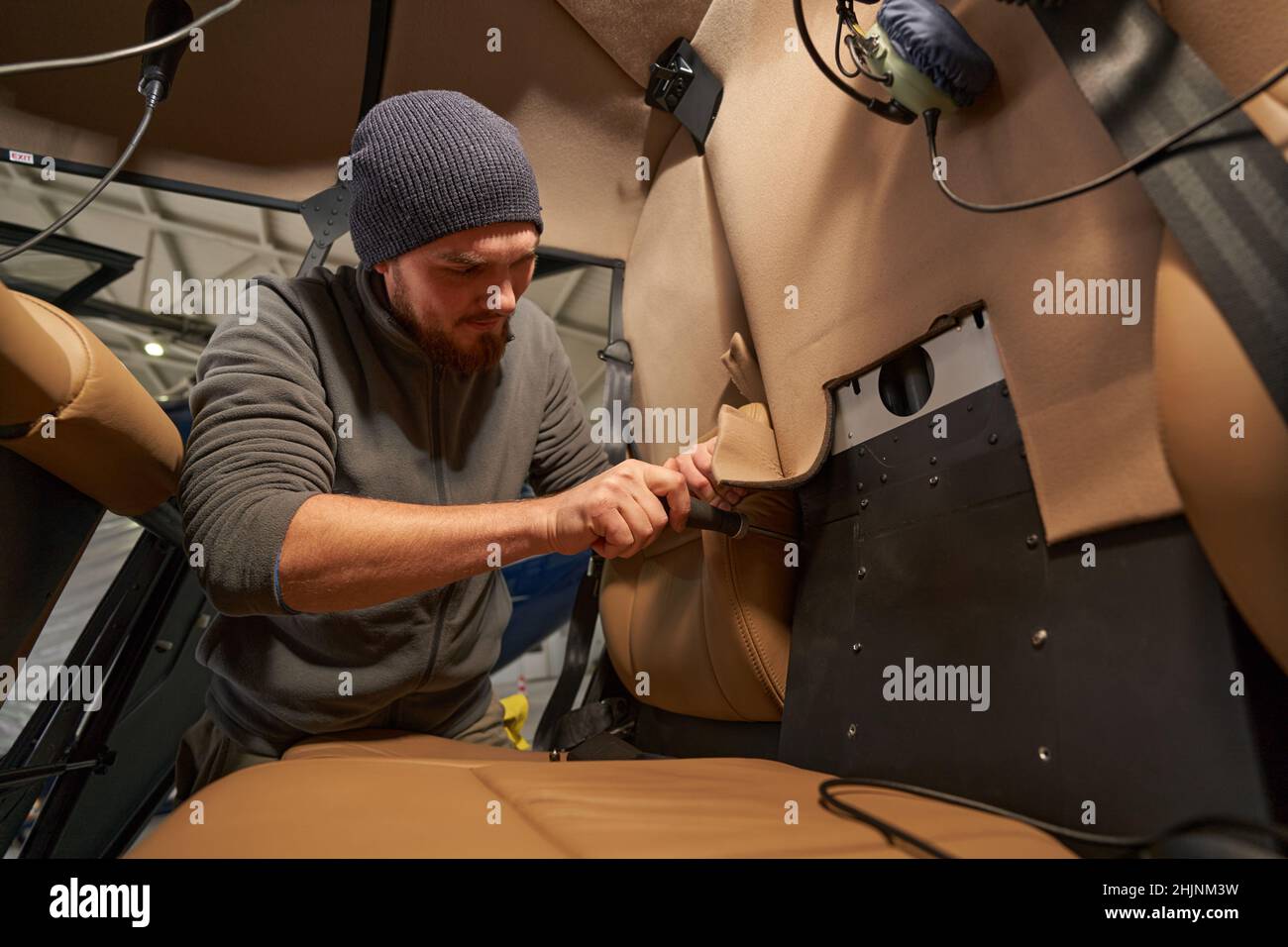 Strong Caucasian man engineer modernization and renovation interior of ...