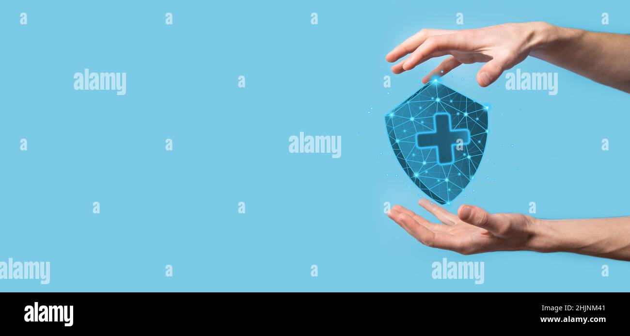 Businessman hold Shield with plus Low polygonal icon, medicine icon ...