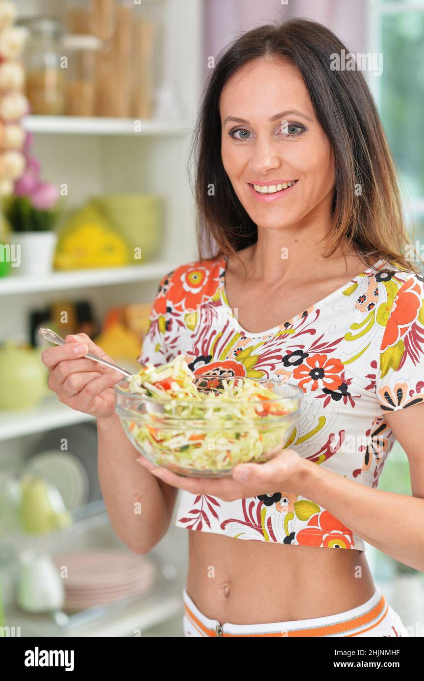 Beautiful model woman cooking hi-res stock photography and images - Alamy