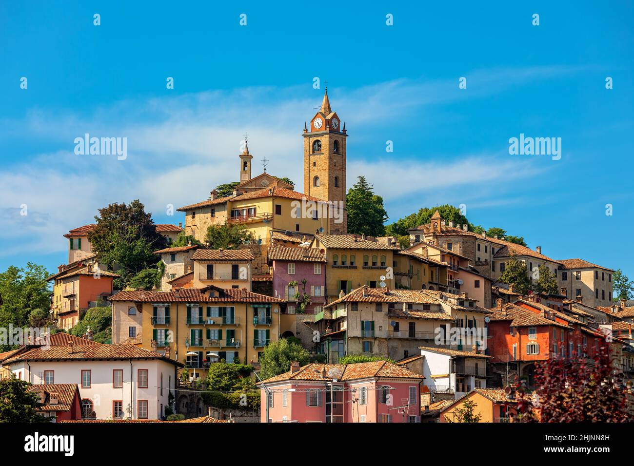 Old town of Monforte d'Alba under blue sky in Piedmont, Northern Italy ...