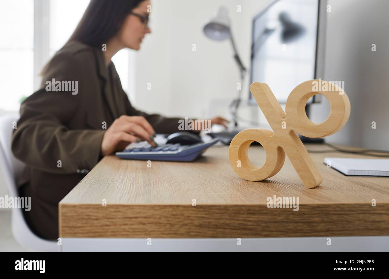 Woman accountant work on computer manage budget Stock Photo - Alamy