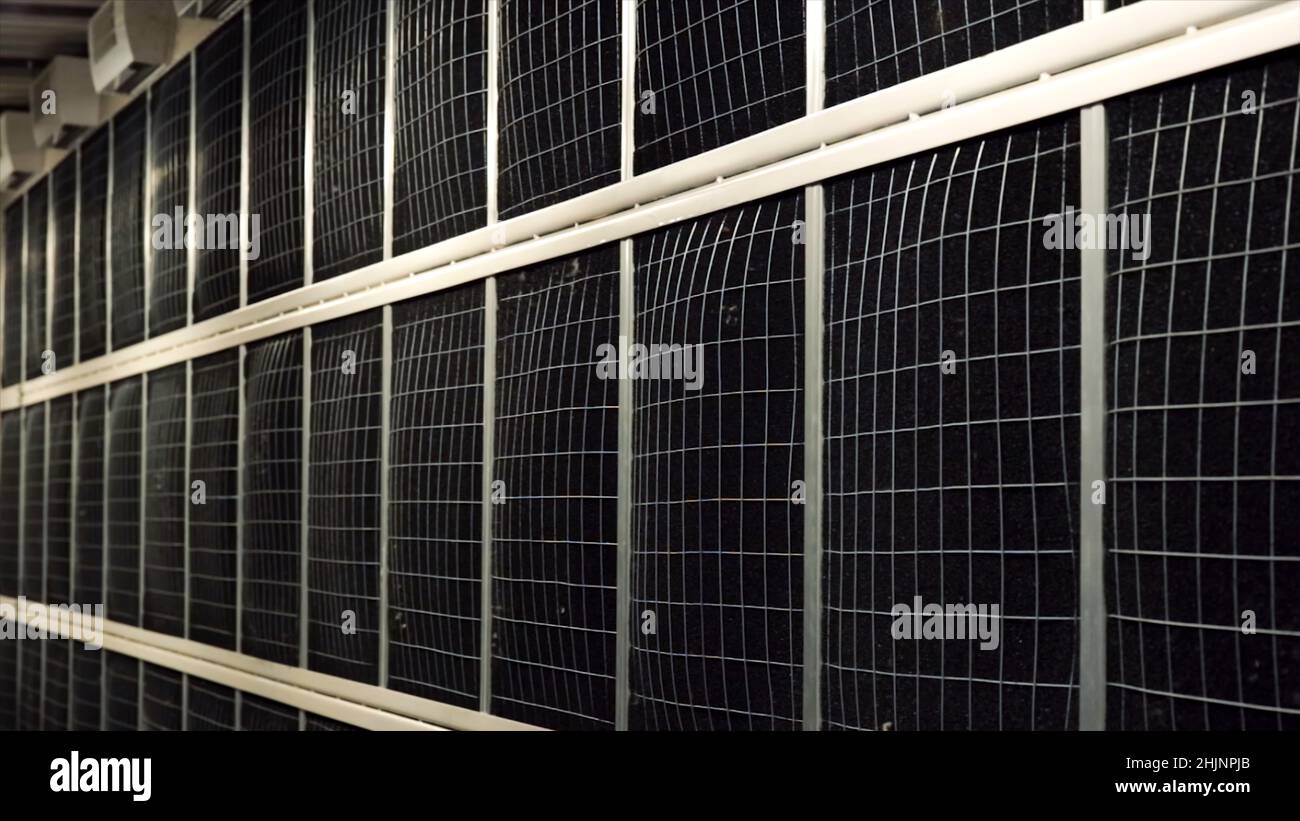 Complex equipment in data center. Stock footage. Black mesh panels for ...