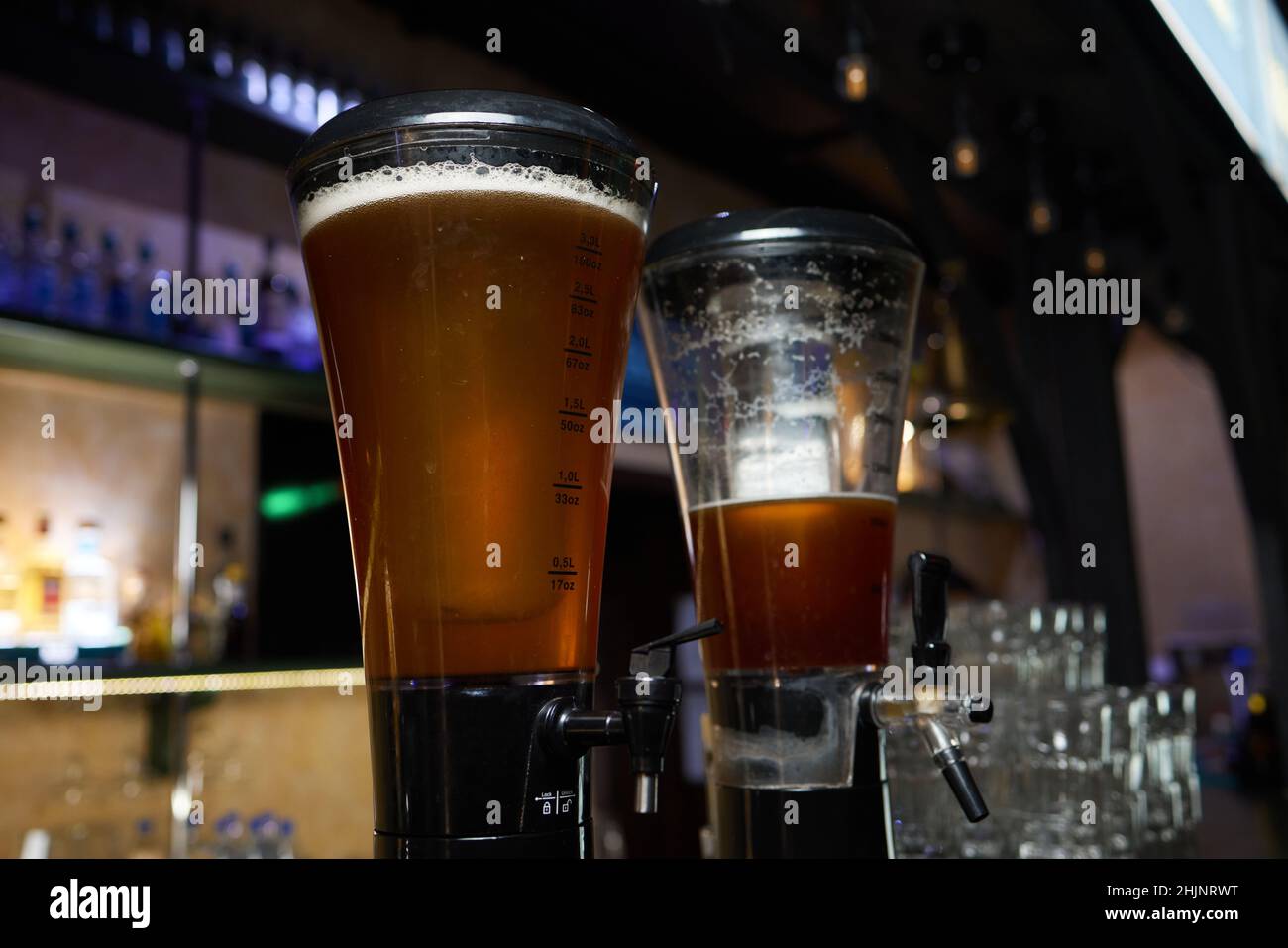 blur background closeup beer tower with bokeh at the night bar Stock ...