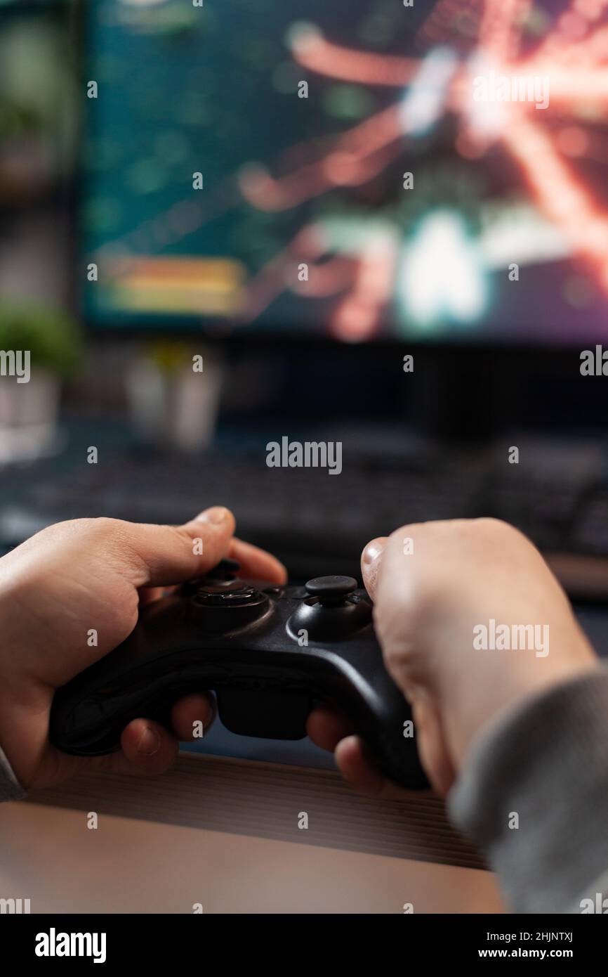 Person playing games tech hi-res stock photography and images - Alamy