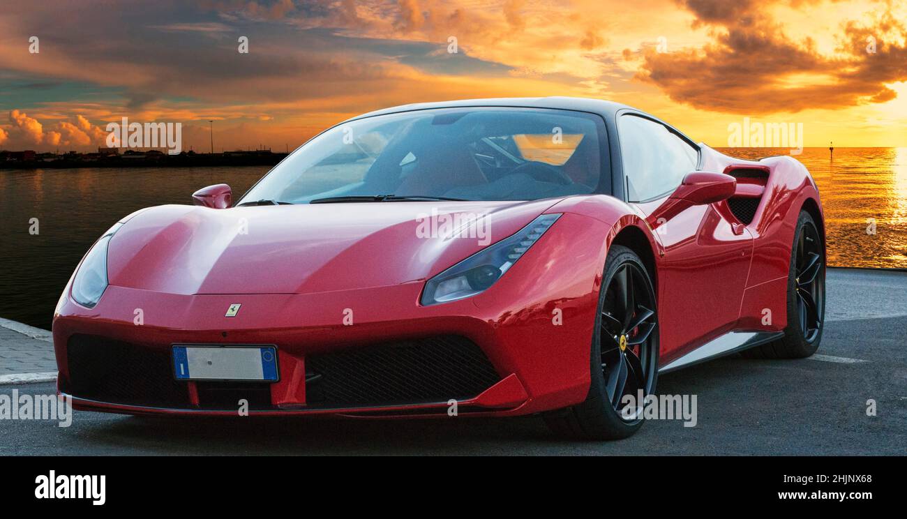 Fast and luxury design of red car model Ferrari 488 GTB located in a ...