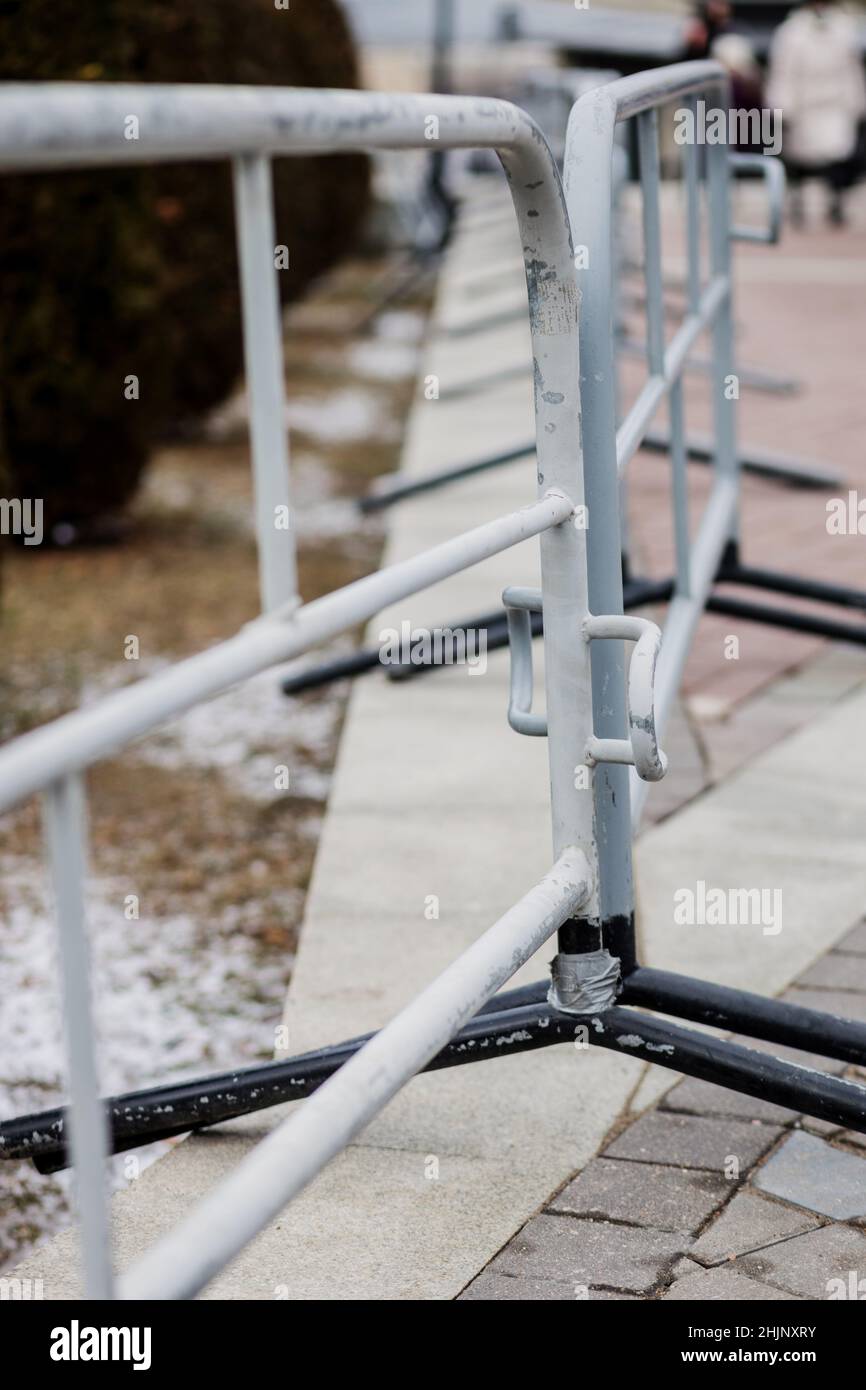 Mobile portable barrier. Metal fence for security events Stock Photo ...