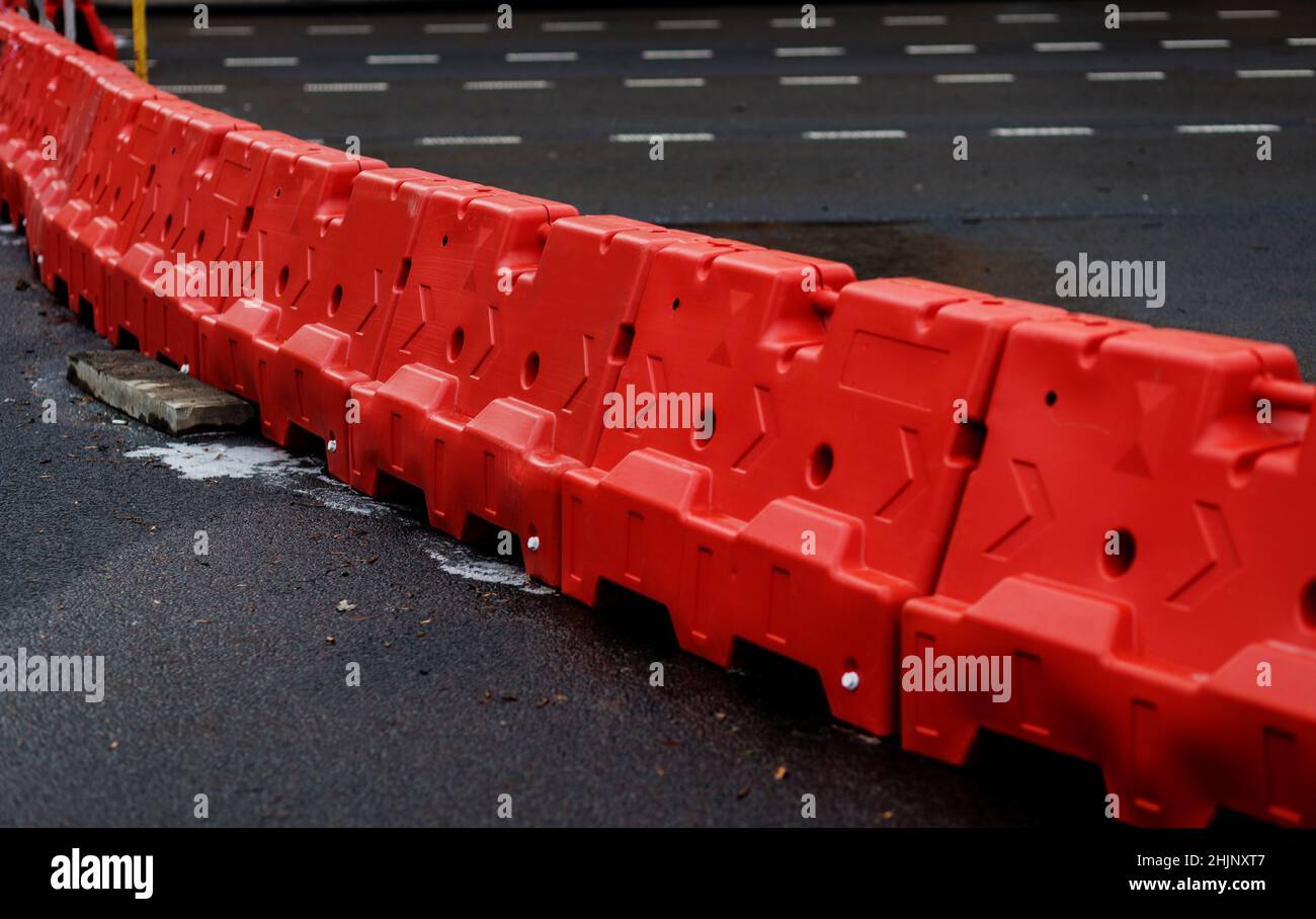 Red plastic safety barriers hi-res stock photography and images - Alamy