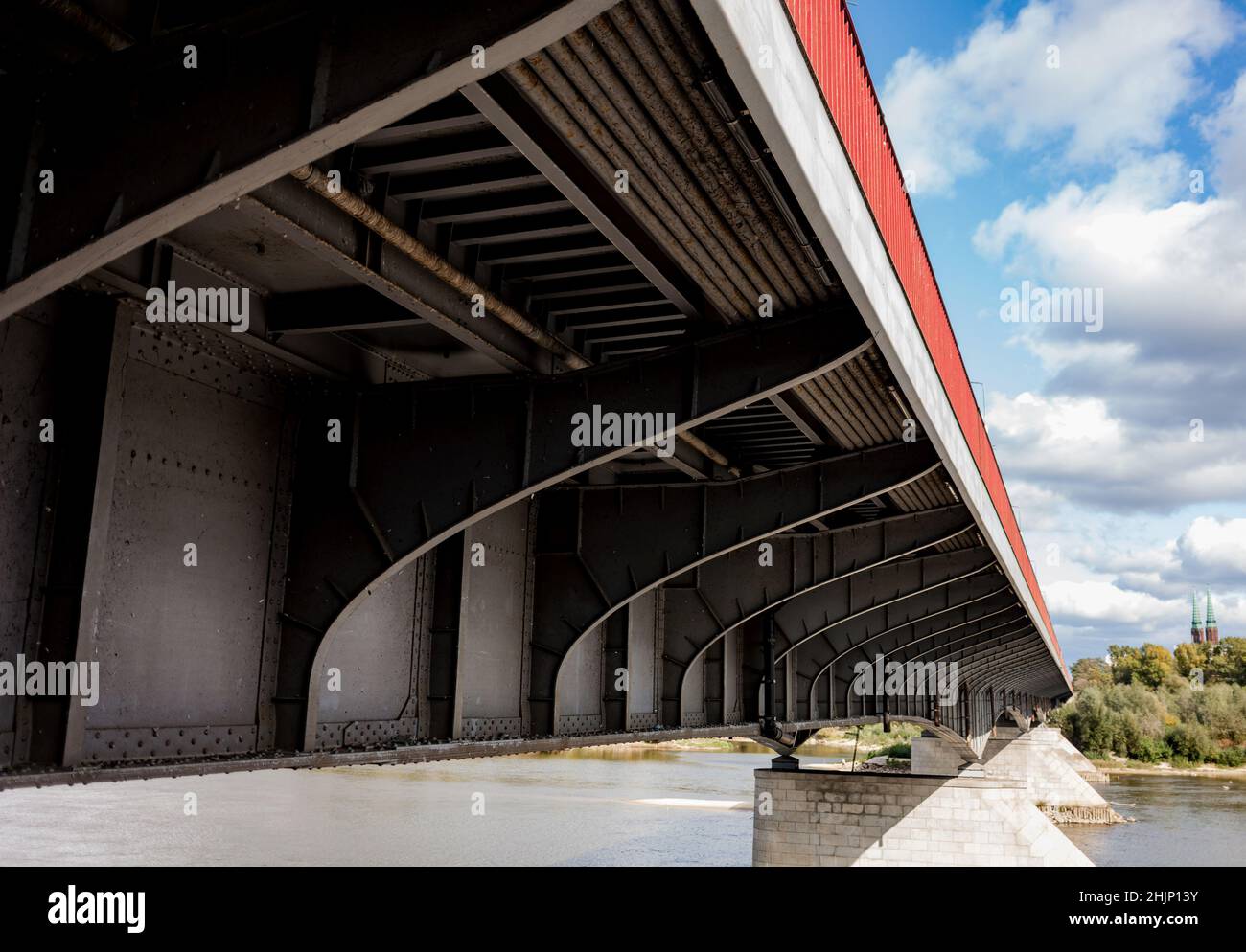 Metal structure that forms part of a construction of a bridge over sky ...