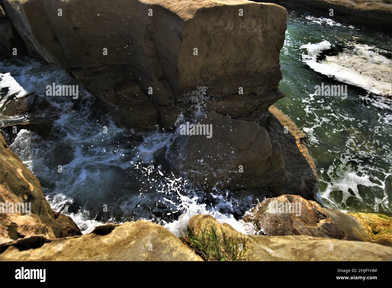 High angle shot of water splashing on rocks Stock Photo - Alamy