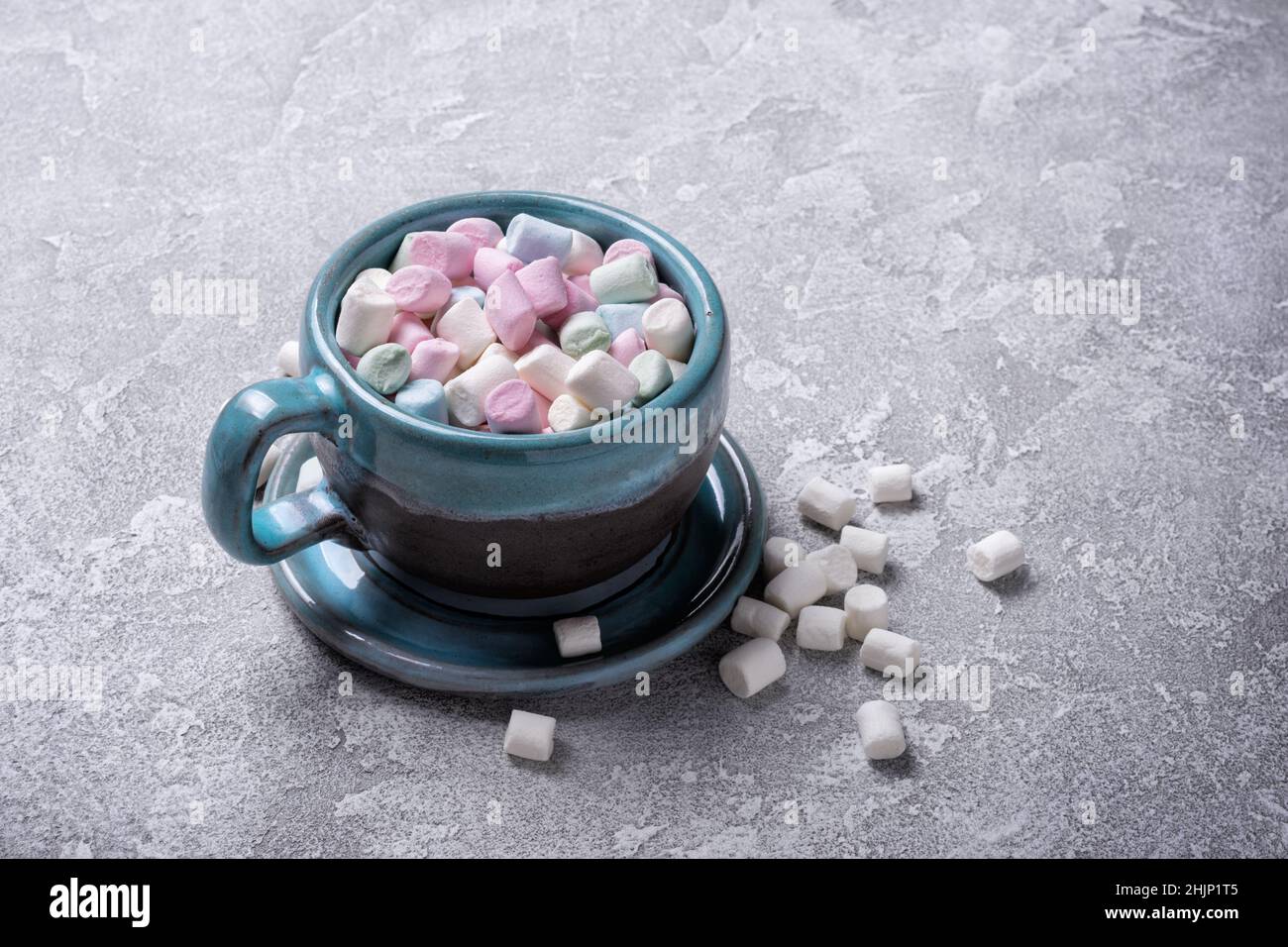 Big blue cup with mini colored marshmallows for hot chocolate, cocoa ...