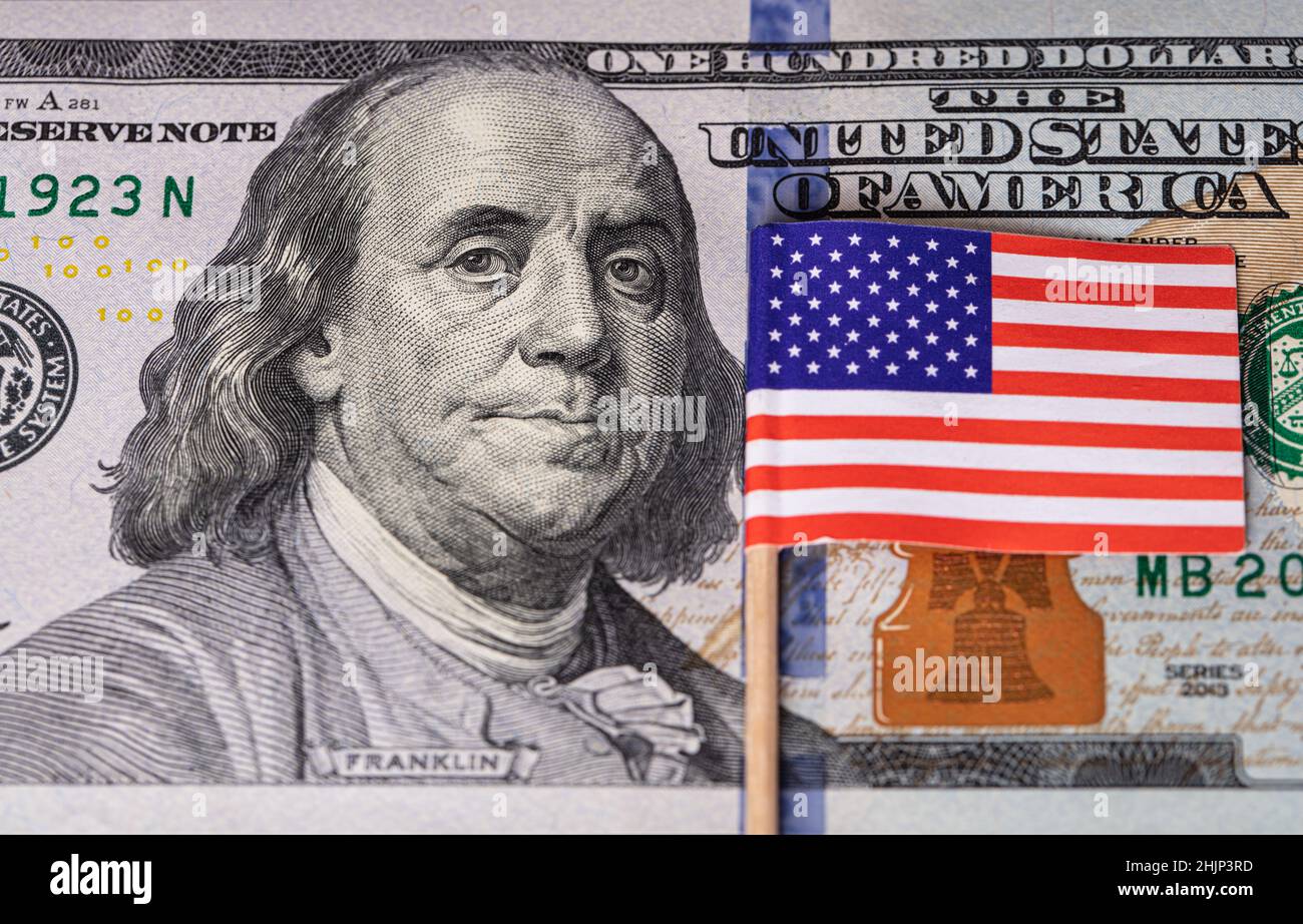 U.S. 100 dollar banknote on american flag background for design purpose ...