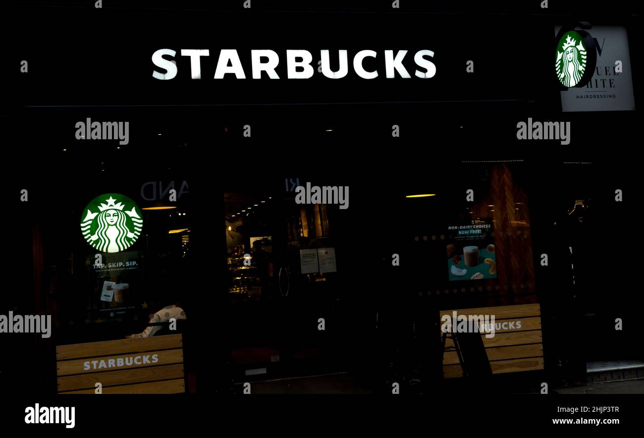 Starbucks sign at night hi-res stock photography and images - Alamy