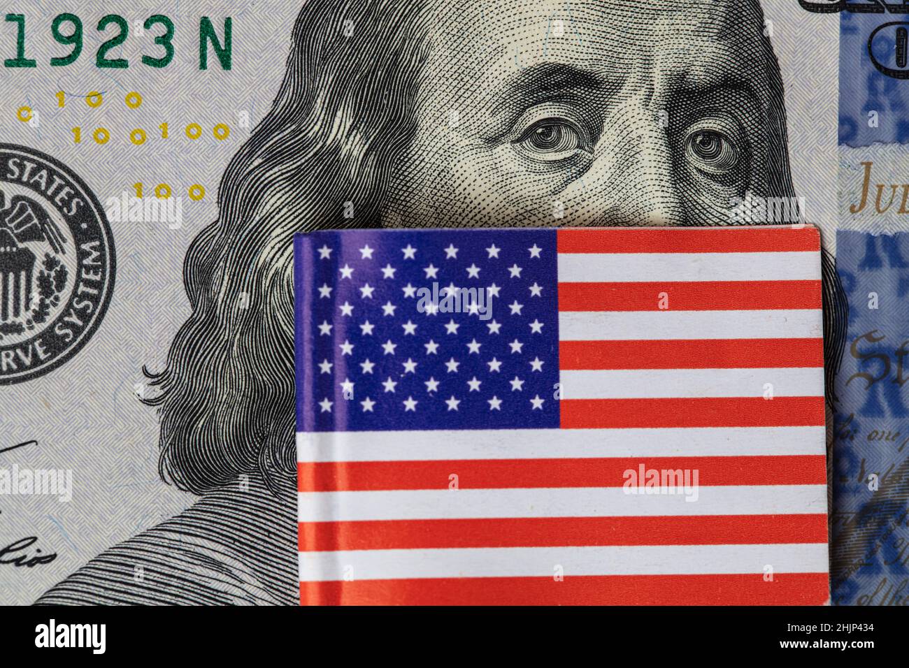 U.S. 100 dollar banknote on american flag background for design purpose ...