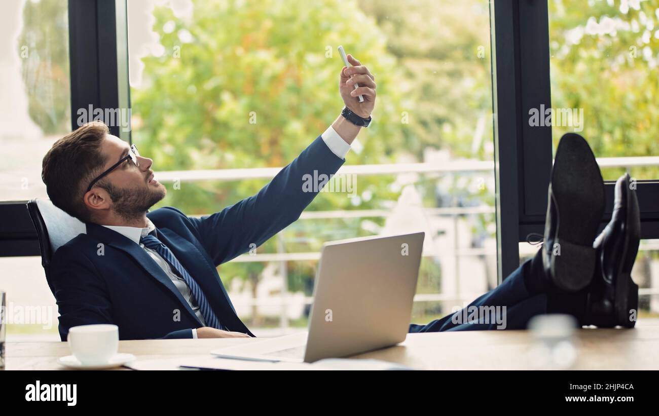 Businessman sit desk take hi-res stock photography and images - Alamy
