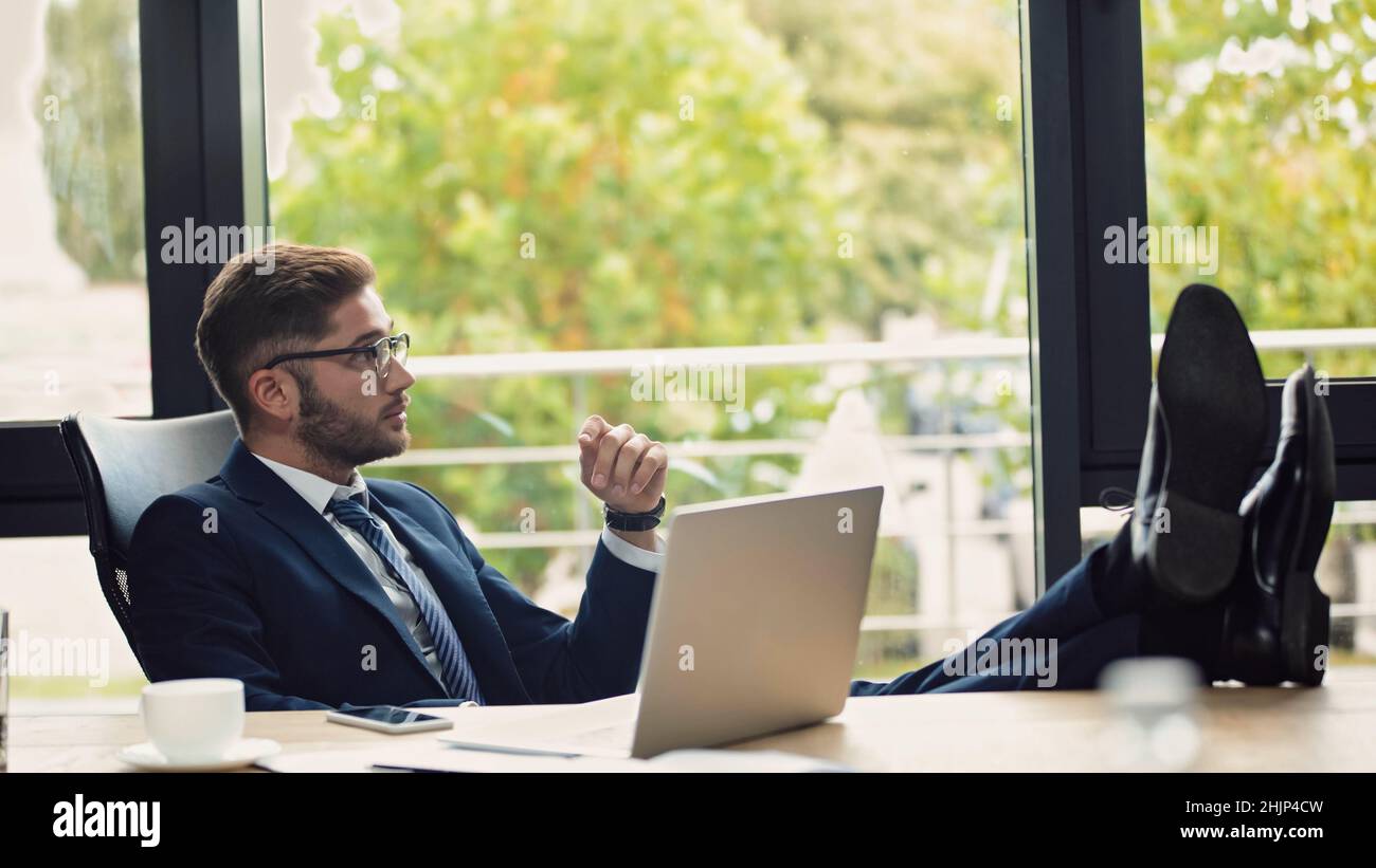 Legs on desk hi-res stock photography and images - Alamy