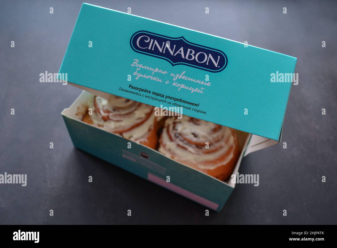 Moscow, Russia, November 2019: Two classic rolls with cinnamon and ...