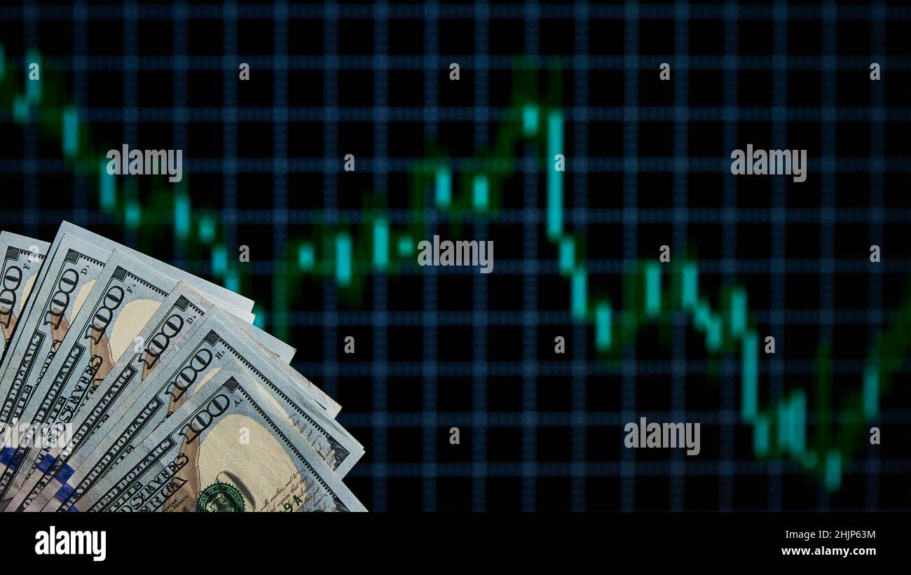 US dollar bills an backgrund with stock martket chart, Investment and ...