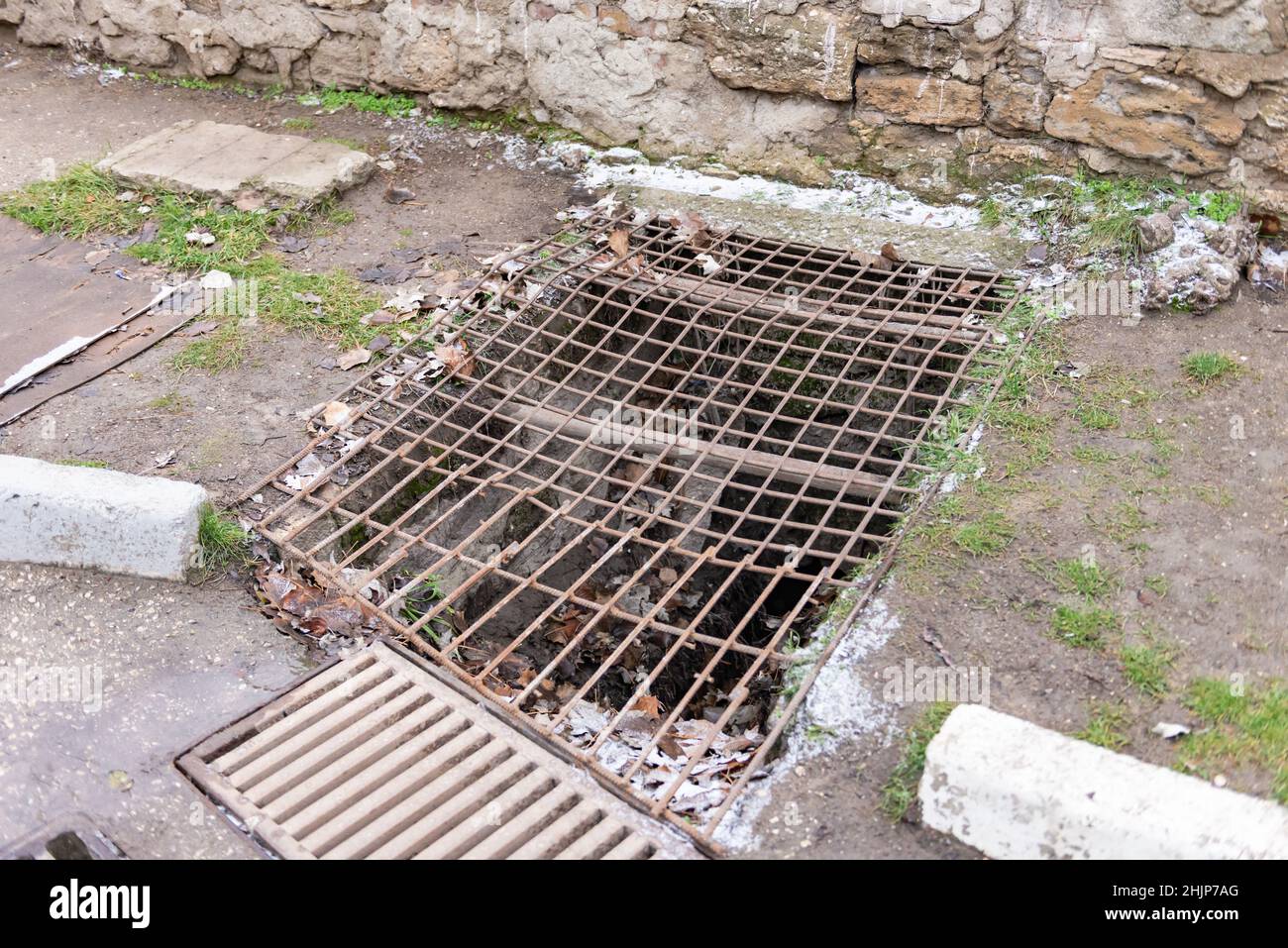 Roadside drainage grate hi-res stock photography and images - Alamy