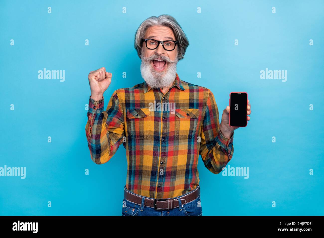 Photo of excited senior man rejoice sucess win lottery awesome hold ...