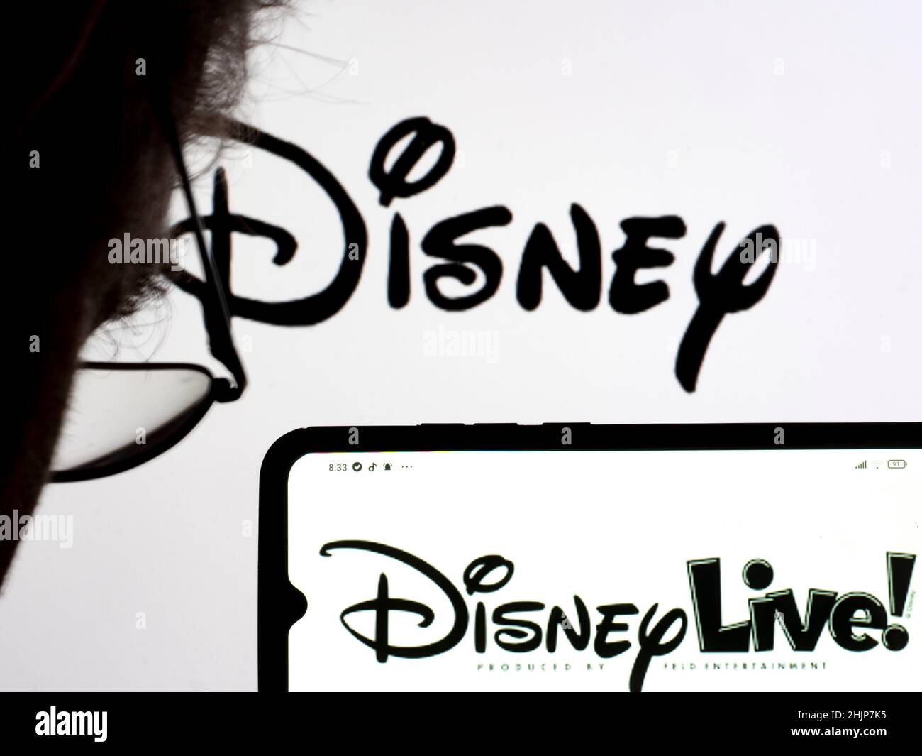 In this photo illustration, the Disney Live! logo is displayed on a ...