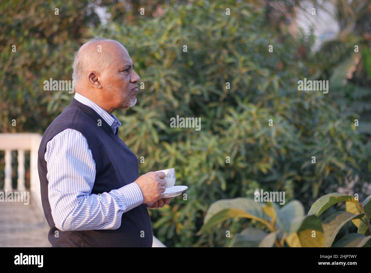 Senior man drinking tea hi-res stock photography and images - Alamy