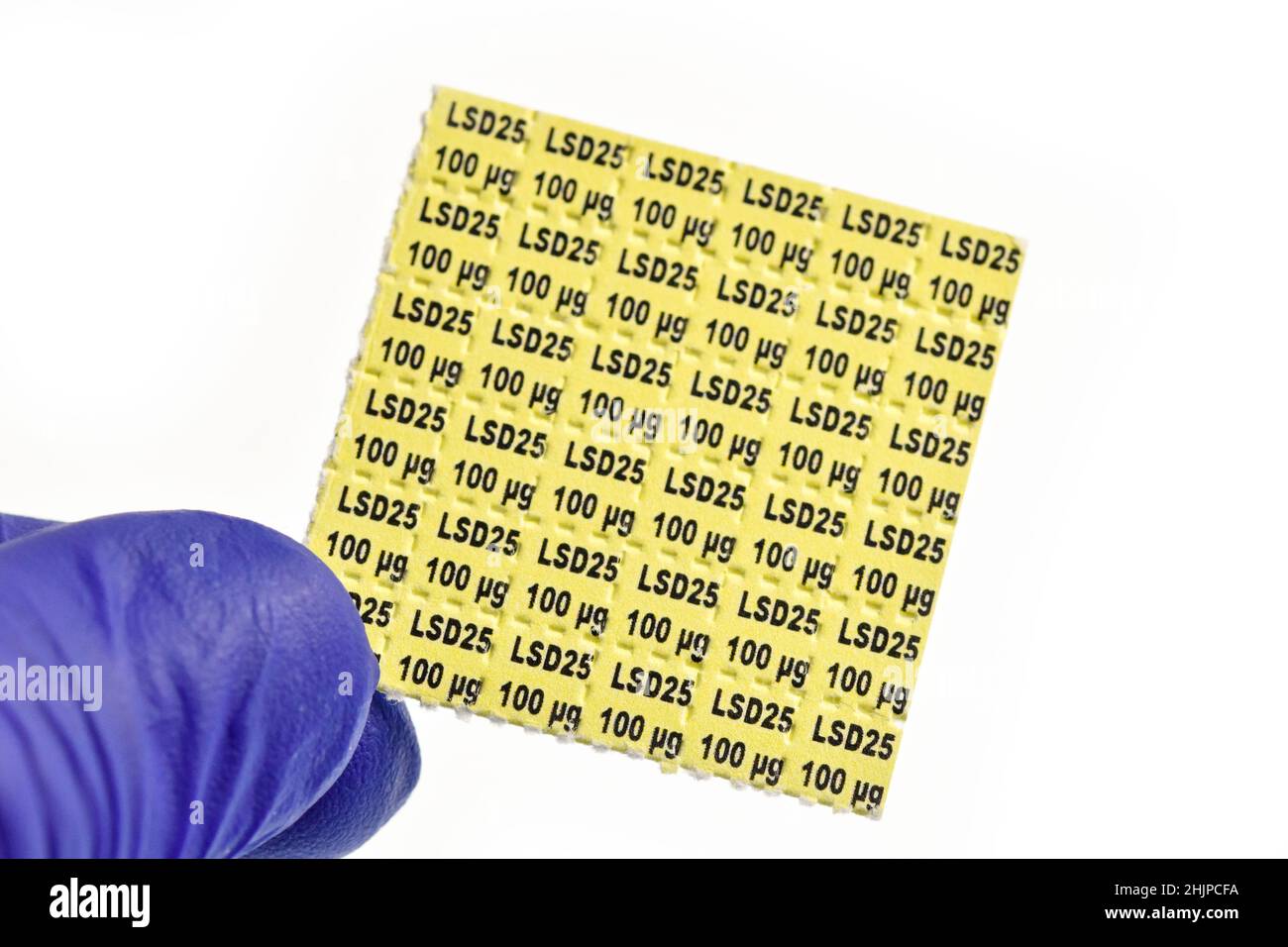 Acid trips, Blotting paper impregnated with the drug L.S.D Stock Photo - Alamy