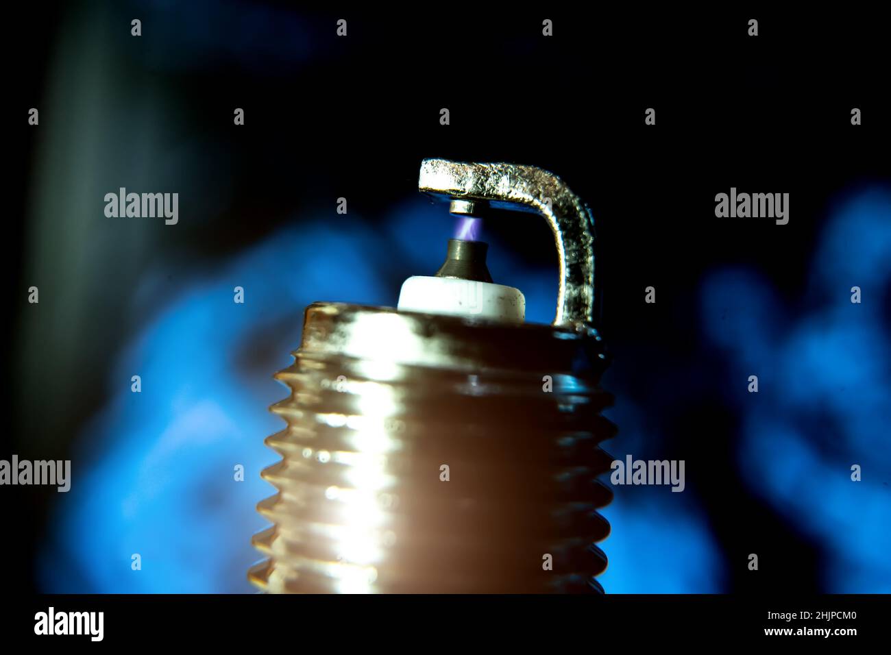 macro photo of a spark plug in close-up on a dark background Stock ...