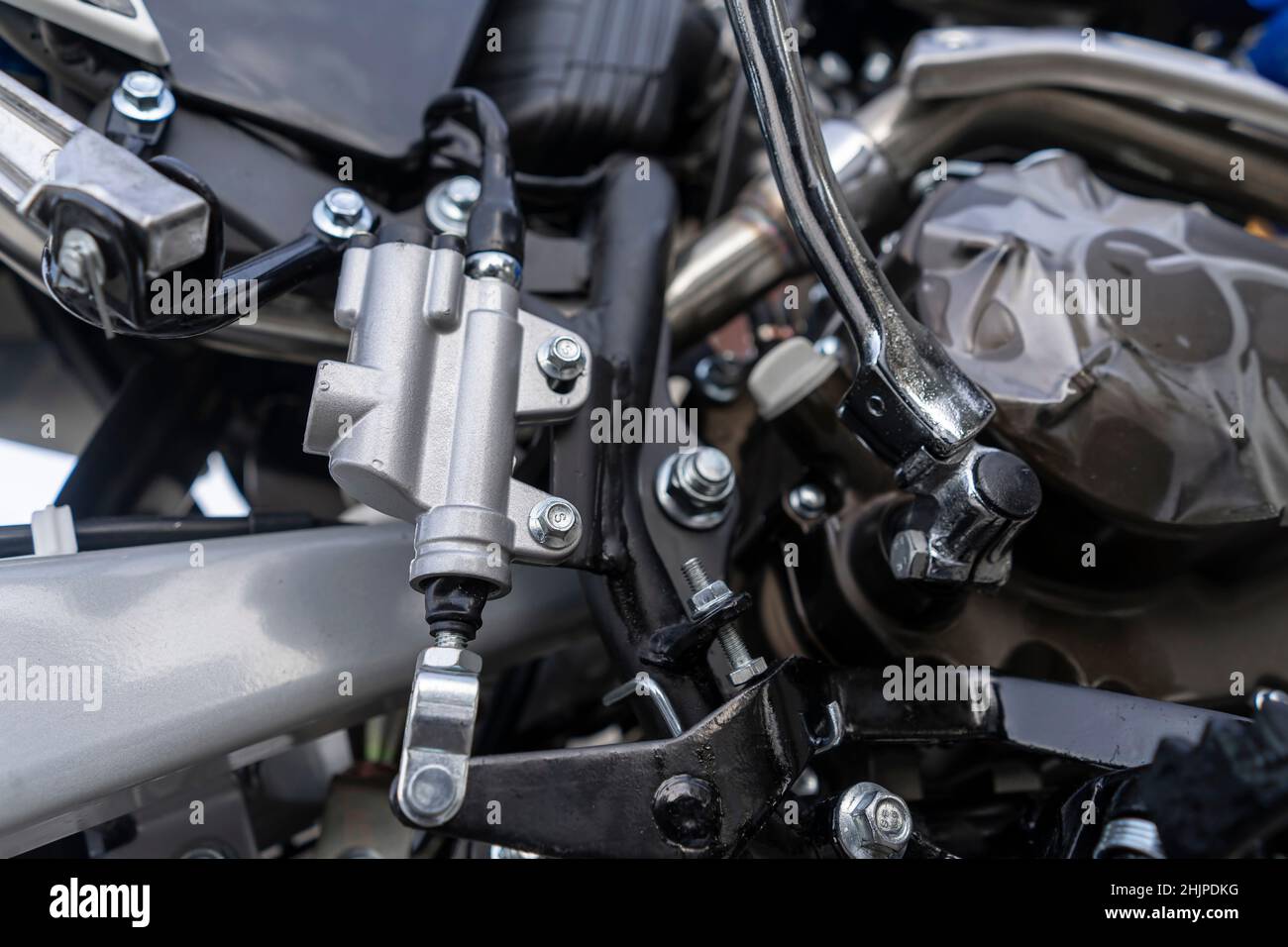 motorcycle rear brake pump close-up Stock Photo - Alamy