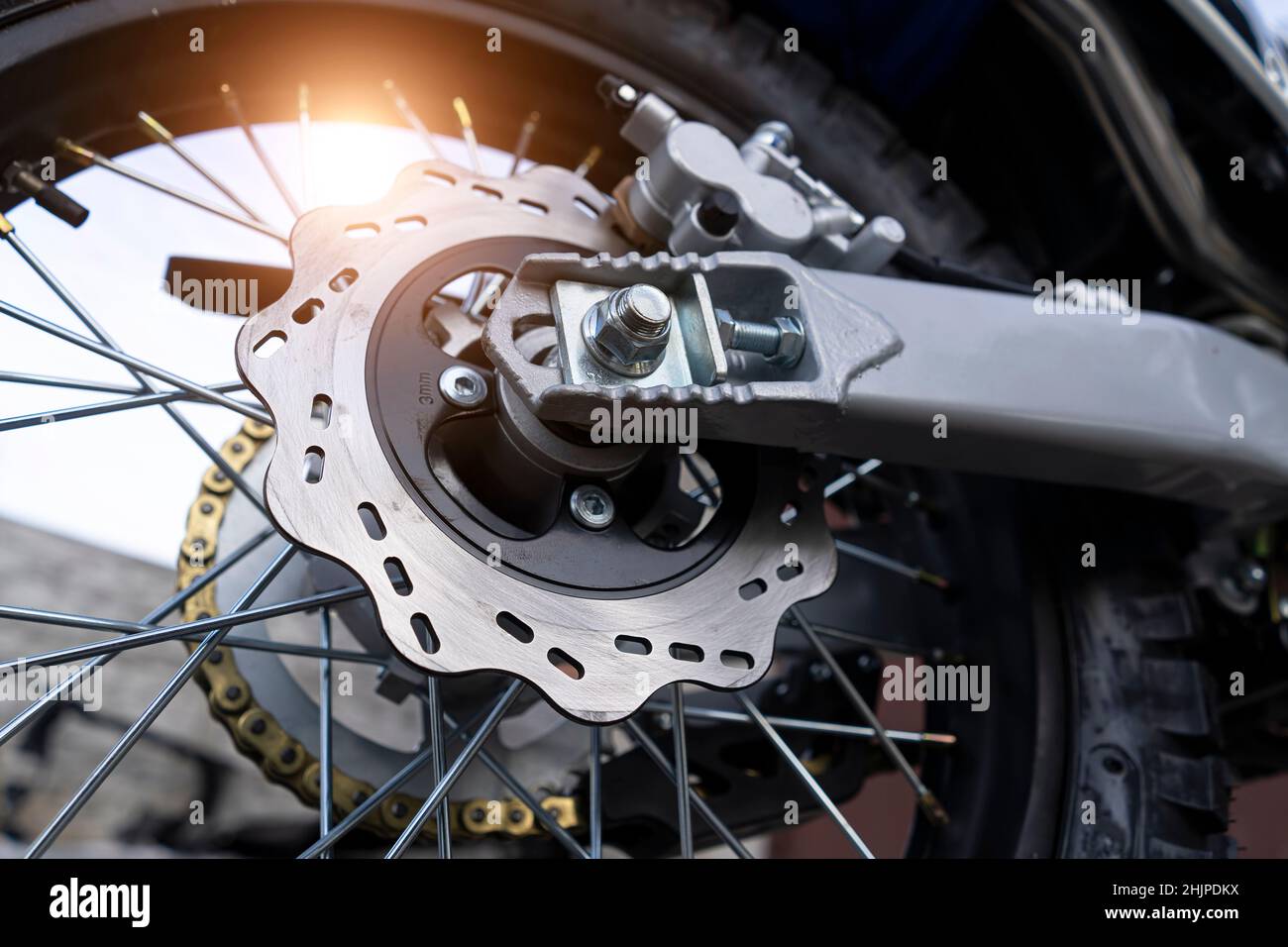 motorcycle rear wheel with brake disc close-up Stock Photo - Alamy