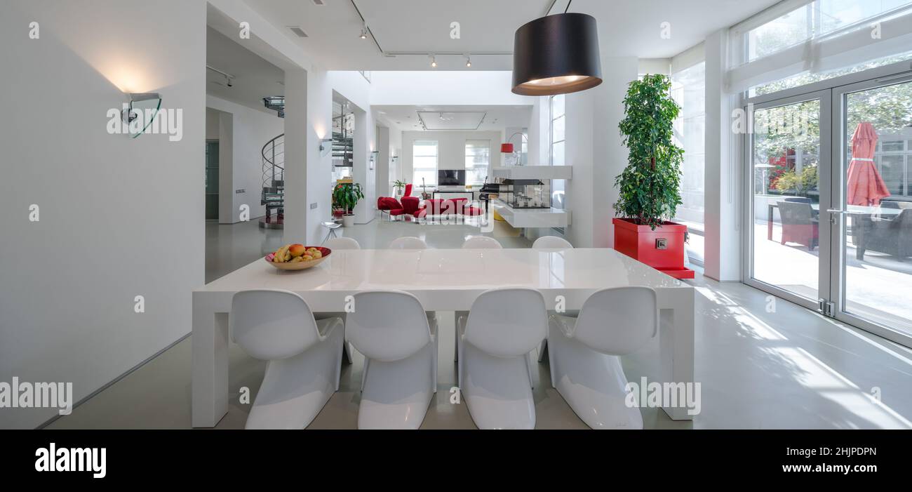 Modern interior of luxury private house. Spacious living room with ...