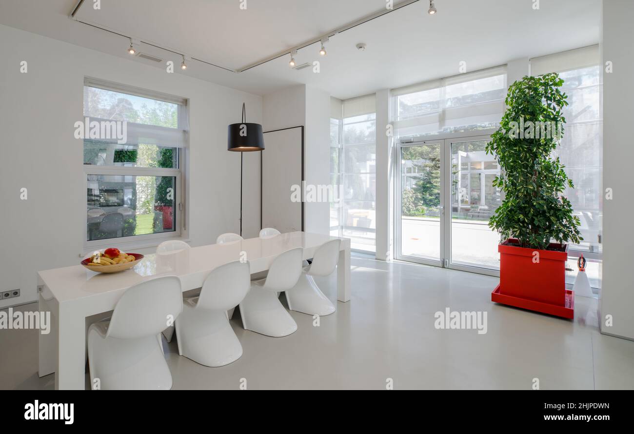 Modern interior of luxury private house. Spacious living room with ...