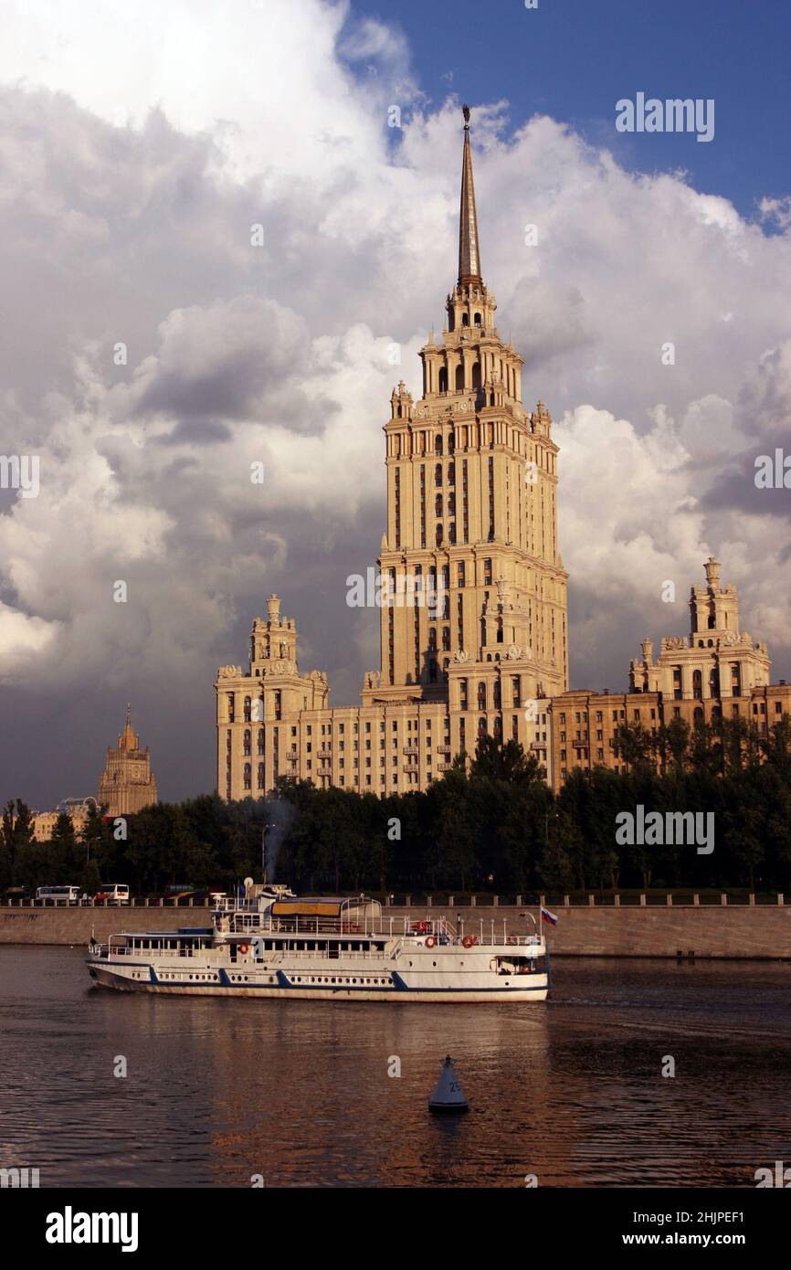 Stalinist skyscraper Hotel Ukraine (Radisson) an sunset on blue sky ...