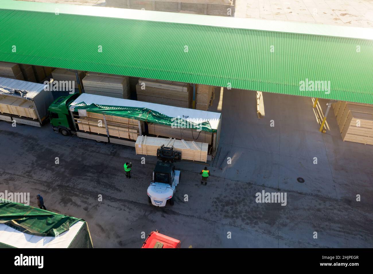loading finished products from wood into a truck top view Stock Photo ...