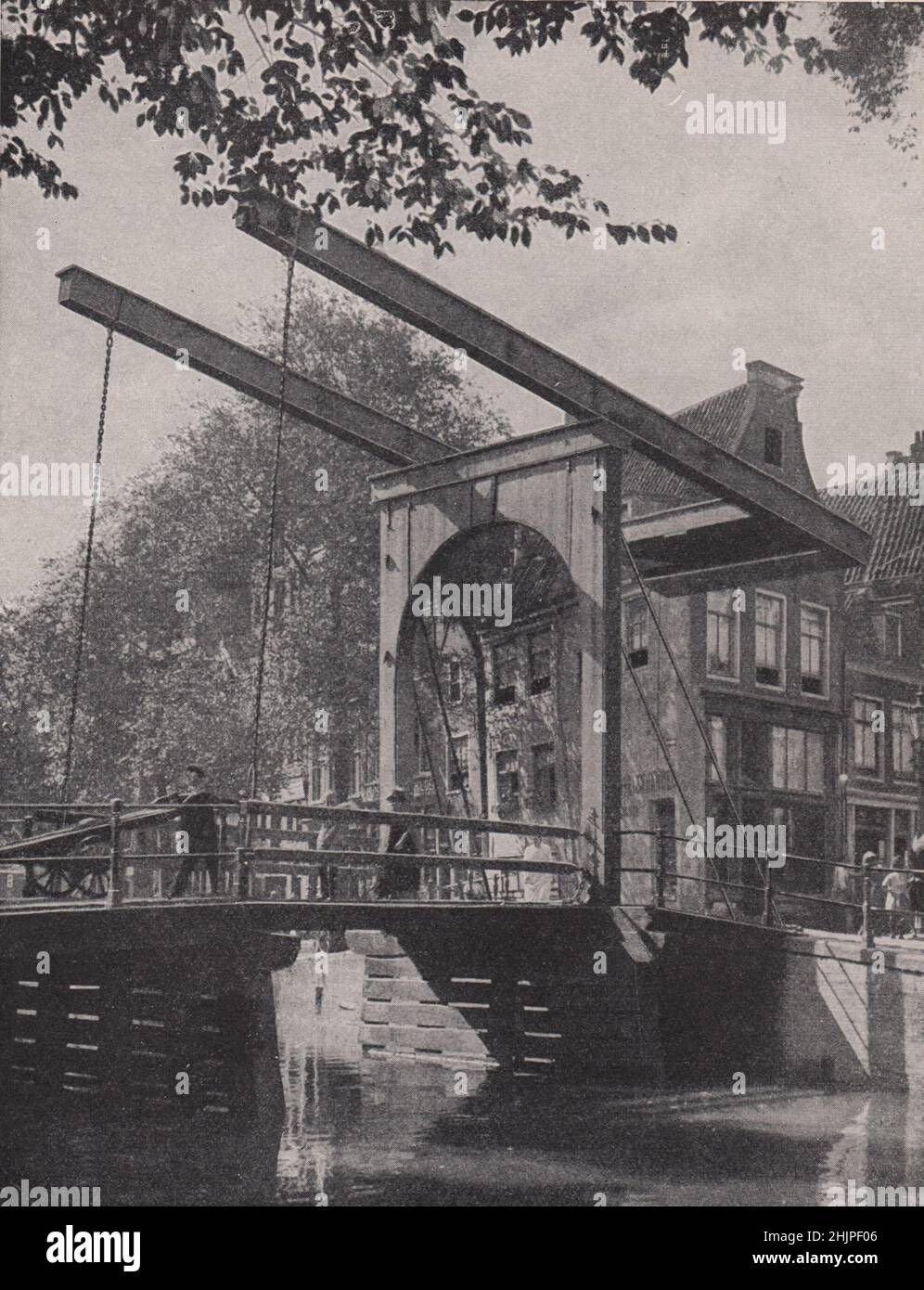 Ancient drawbridge in an old quarter of the city. Netherlands ...