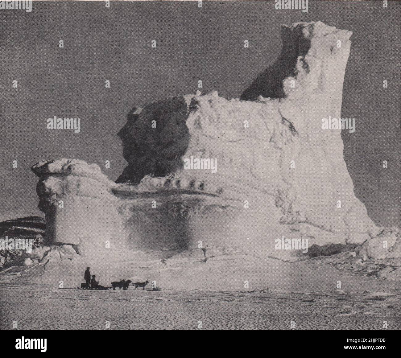 Weirdly weathered mass of a southern iceberg. Antarctica (1923 Stock ...
