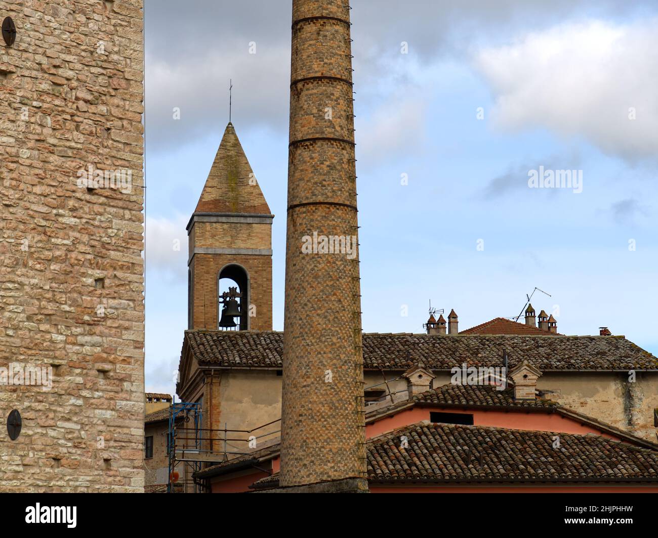an old industrial brick chimney inside a village Stock Photo - Alamy
