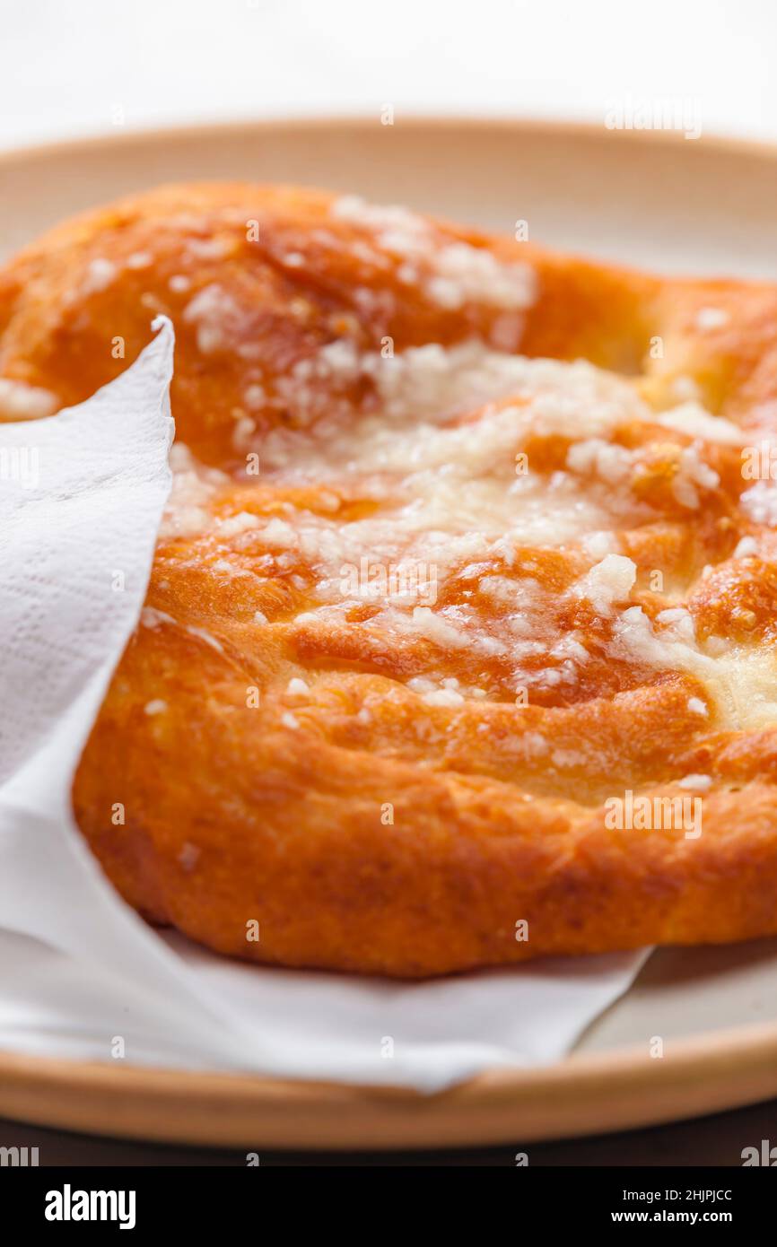 Hungarian typical food called langos Stock Photo - Alamy