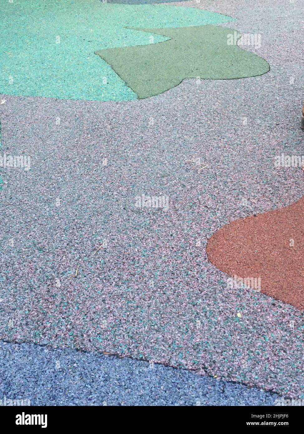 Two colored rubber floor for a play ground Stock Photo - Alamy