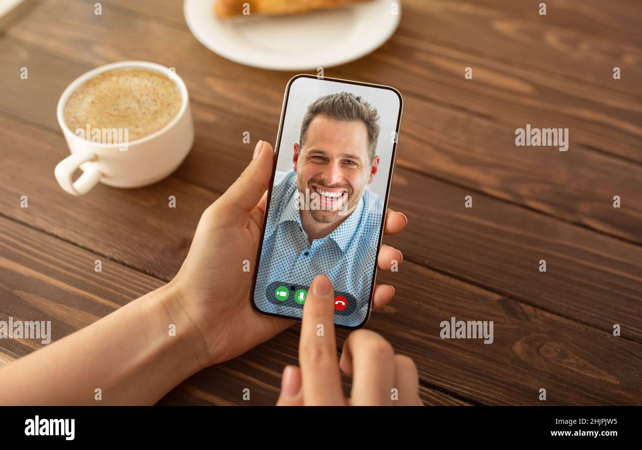 Virtual meeting. Unrecognizable lady having video call with husband on ...