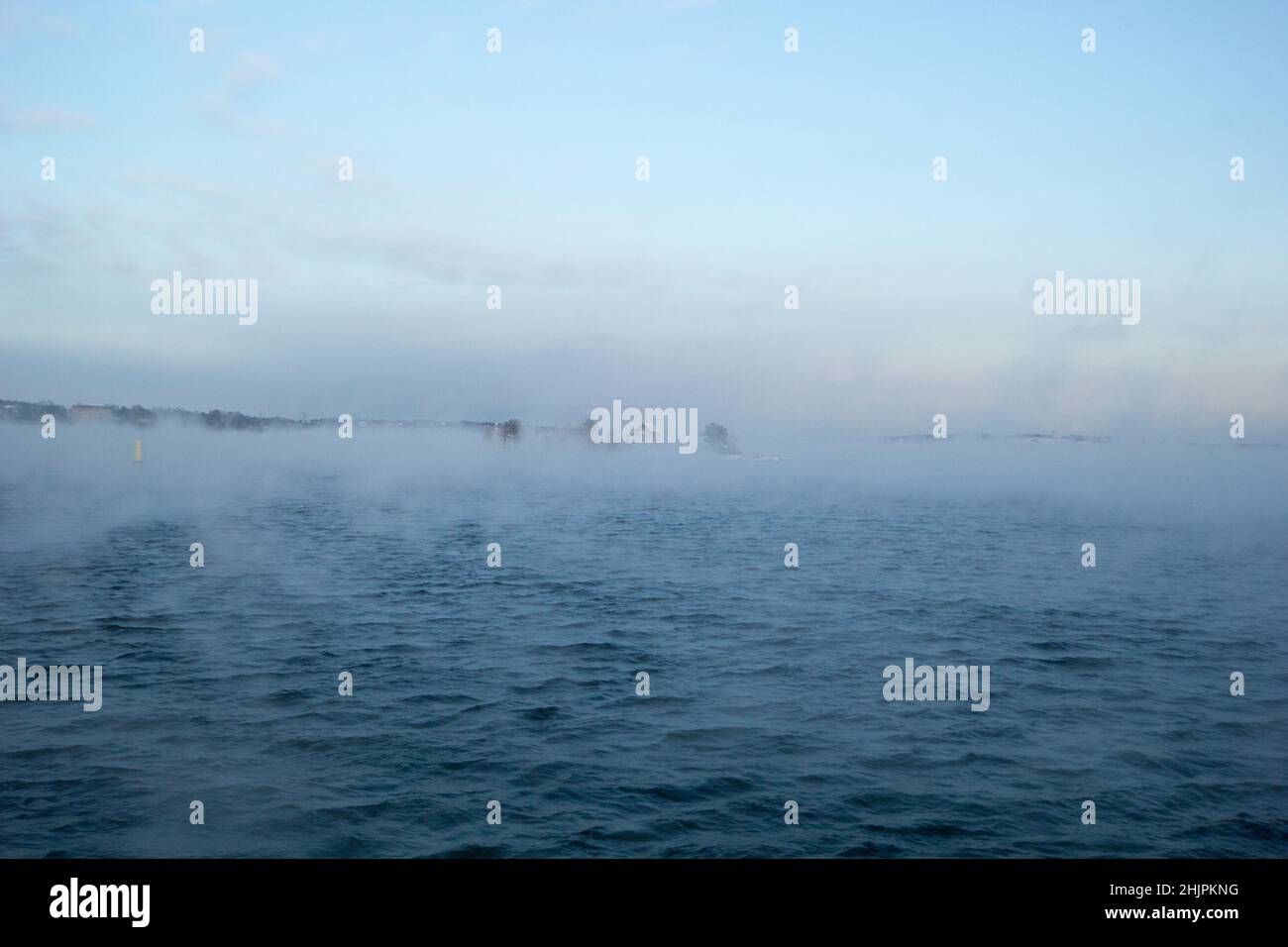 A boat sailing the fog Stock Photo - Alamy