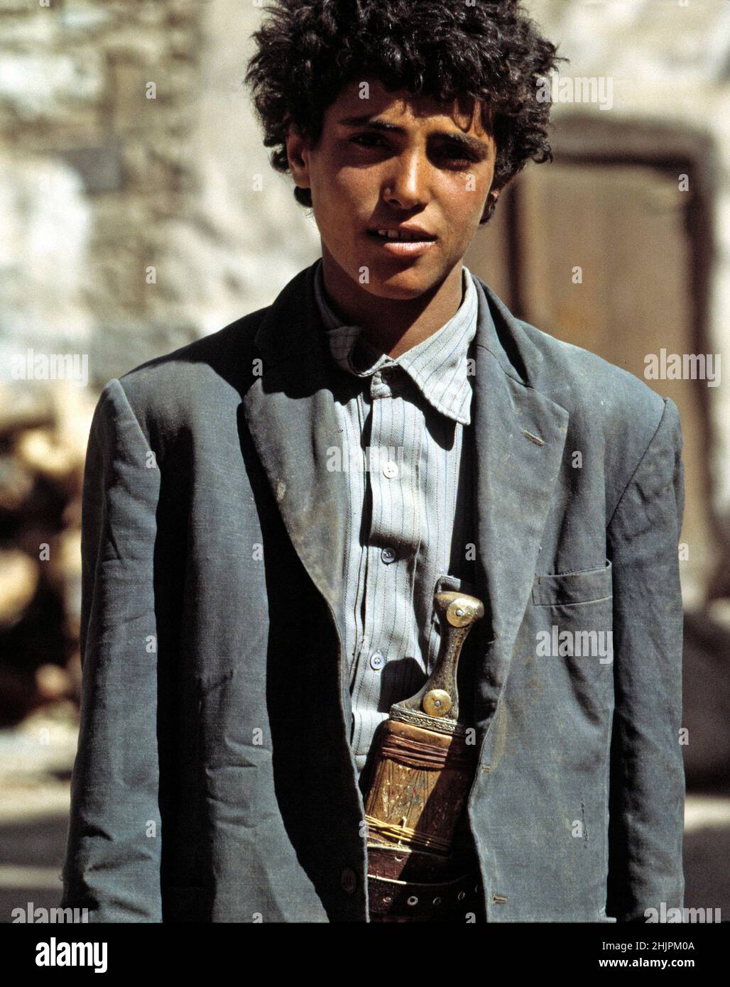 Young Yemeni man with a jambiya at the waist in Sanaa old town, Yemen ...