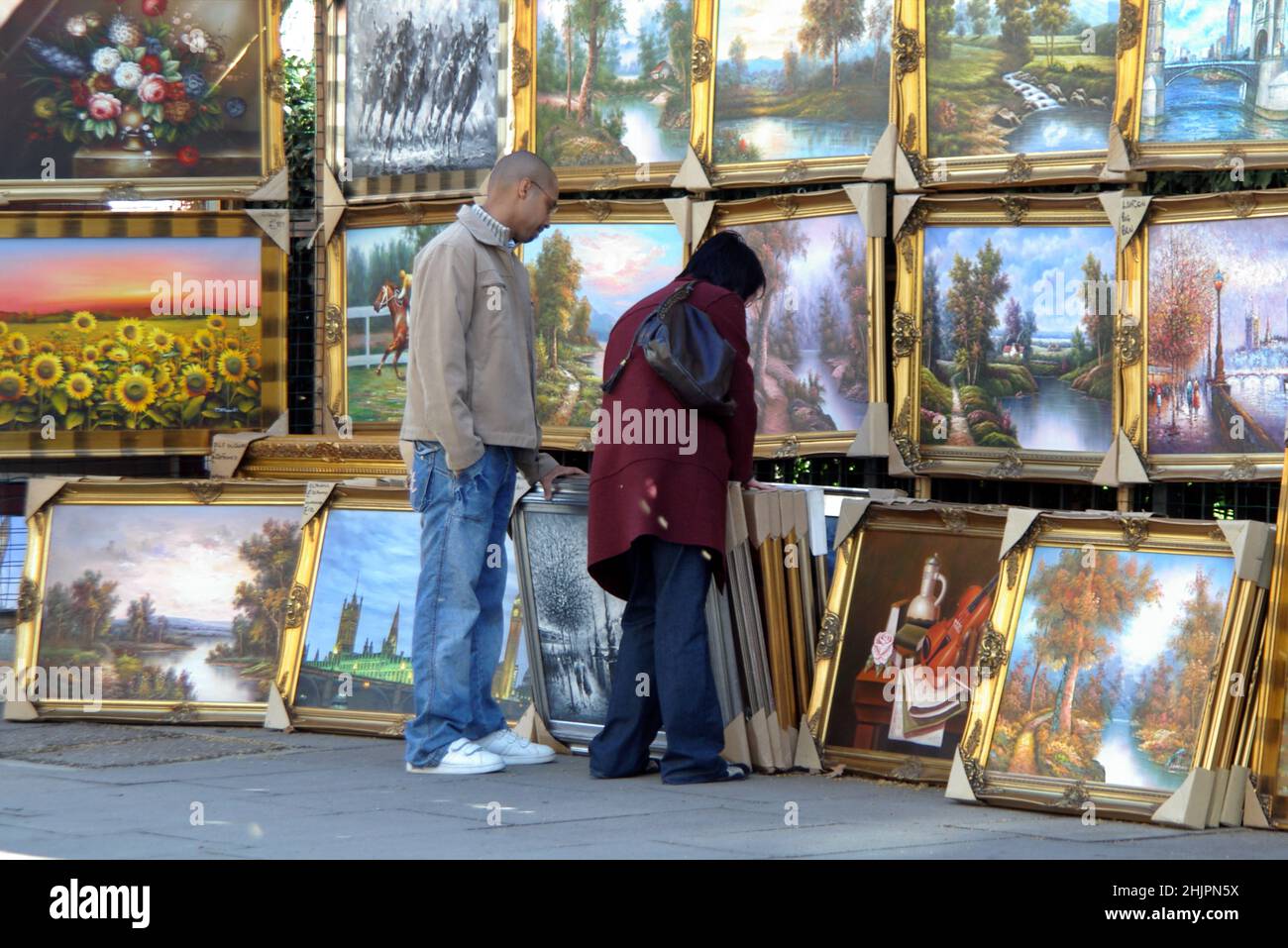 Open air display of paintings on canvas in London, UK Stock Photo - Alamy