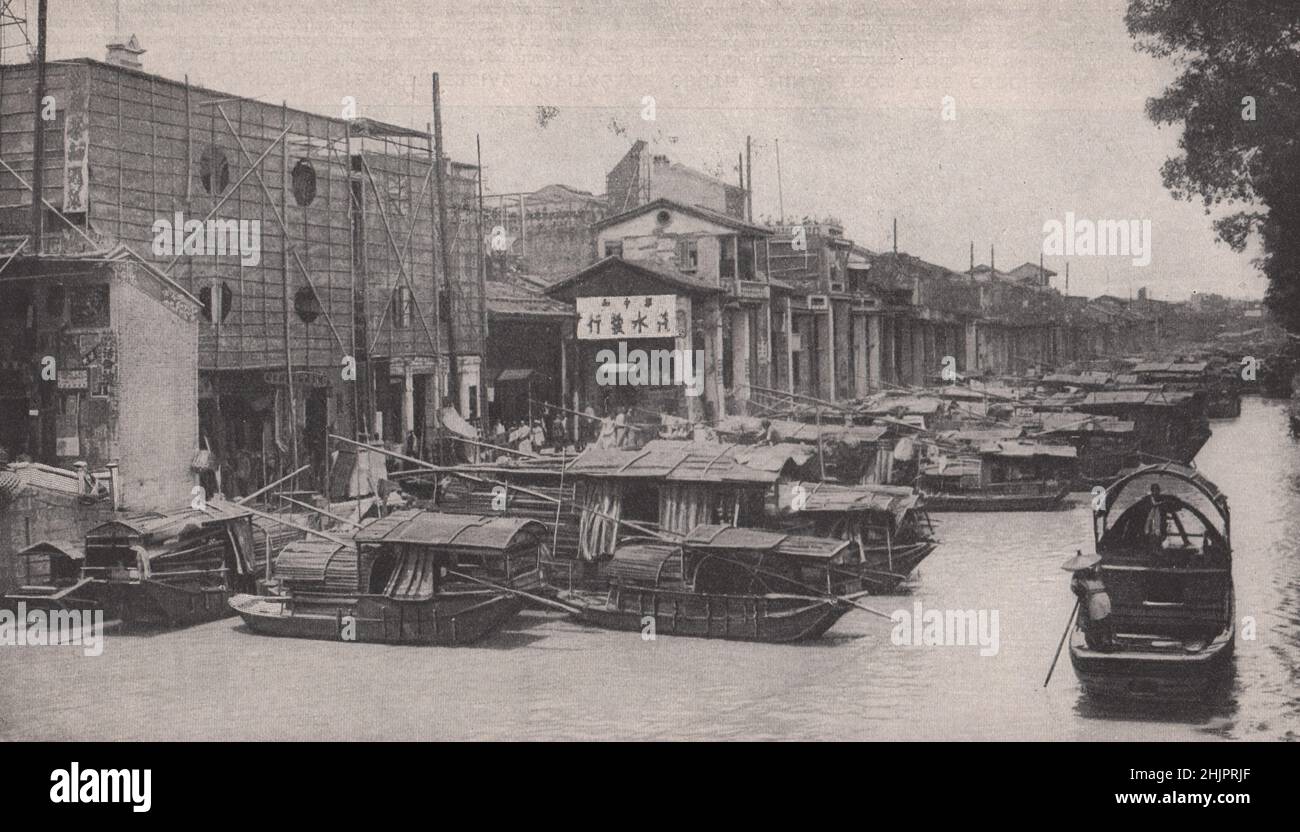 Scene on the Shameen canal showing the water homes of Canton's Floating ...